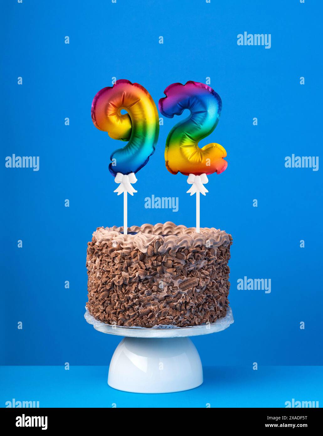 Birthday cake with balloon number 92 - Invitation card on blue ...