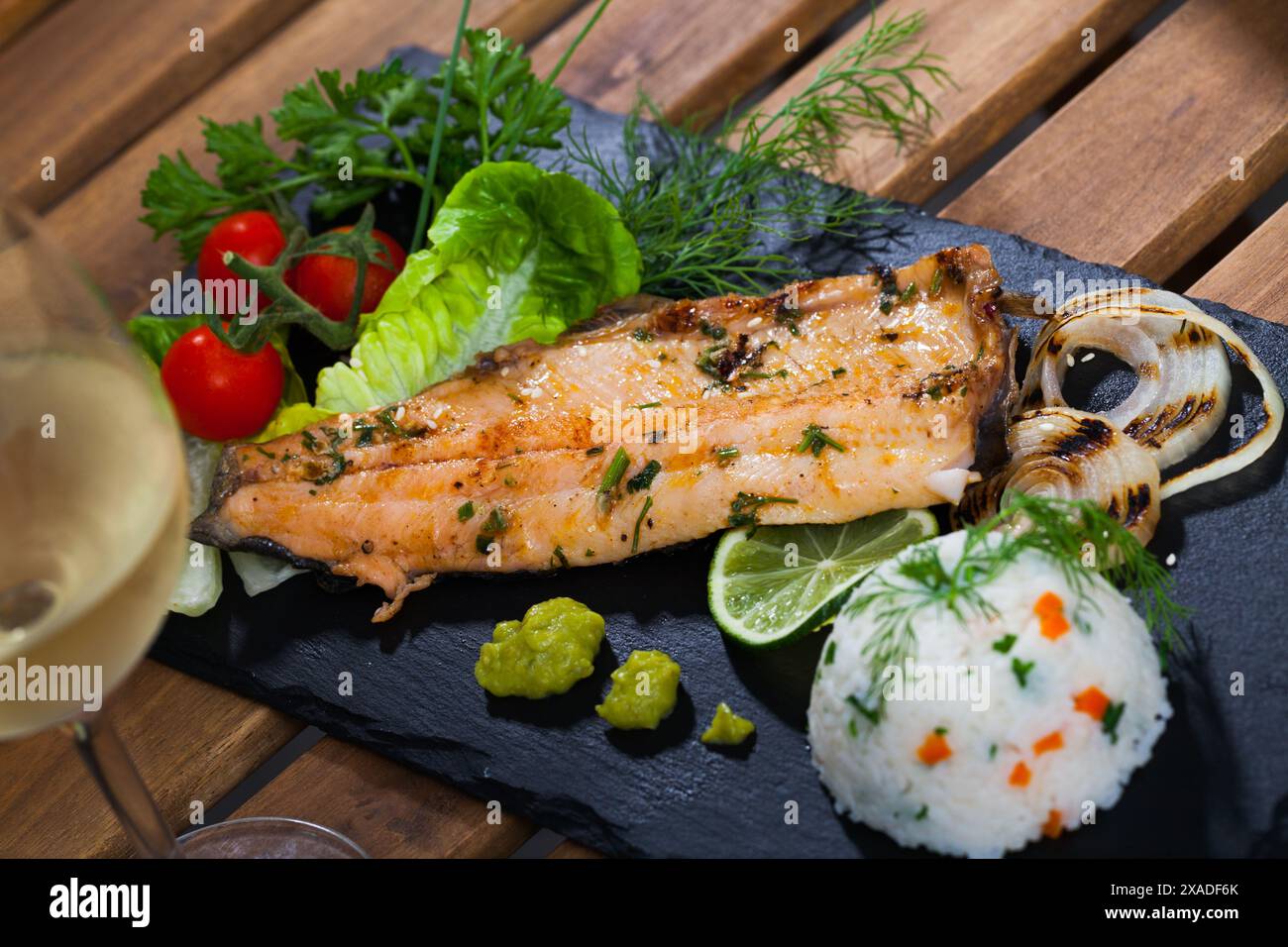 Roasted trout fillet with rice Stock Photo - Alamy