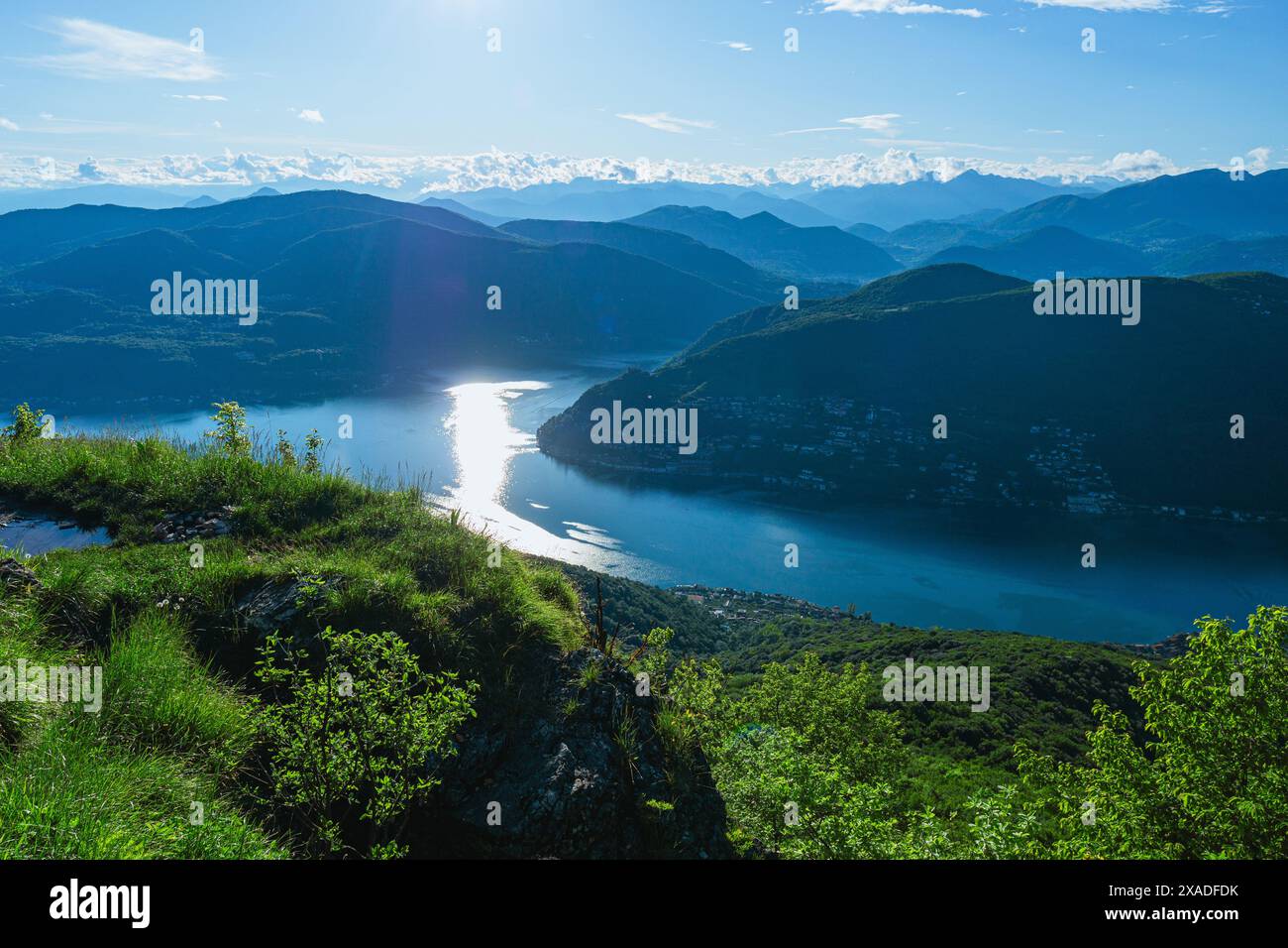 The mountains and the landscape of lake Lugano, during a spring day ...