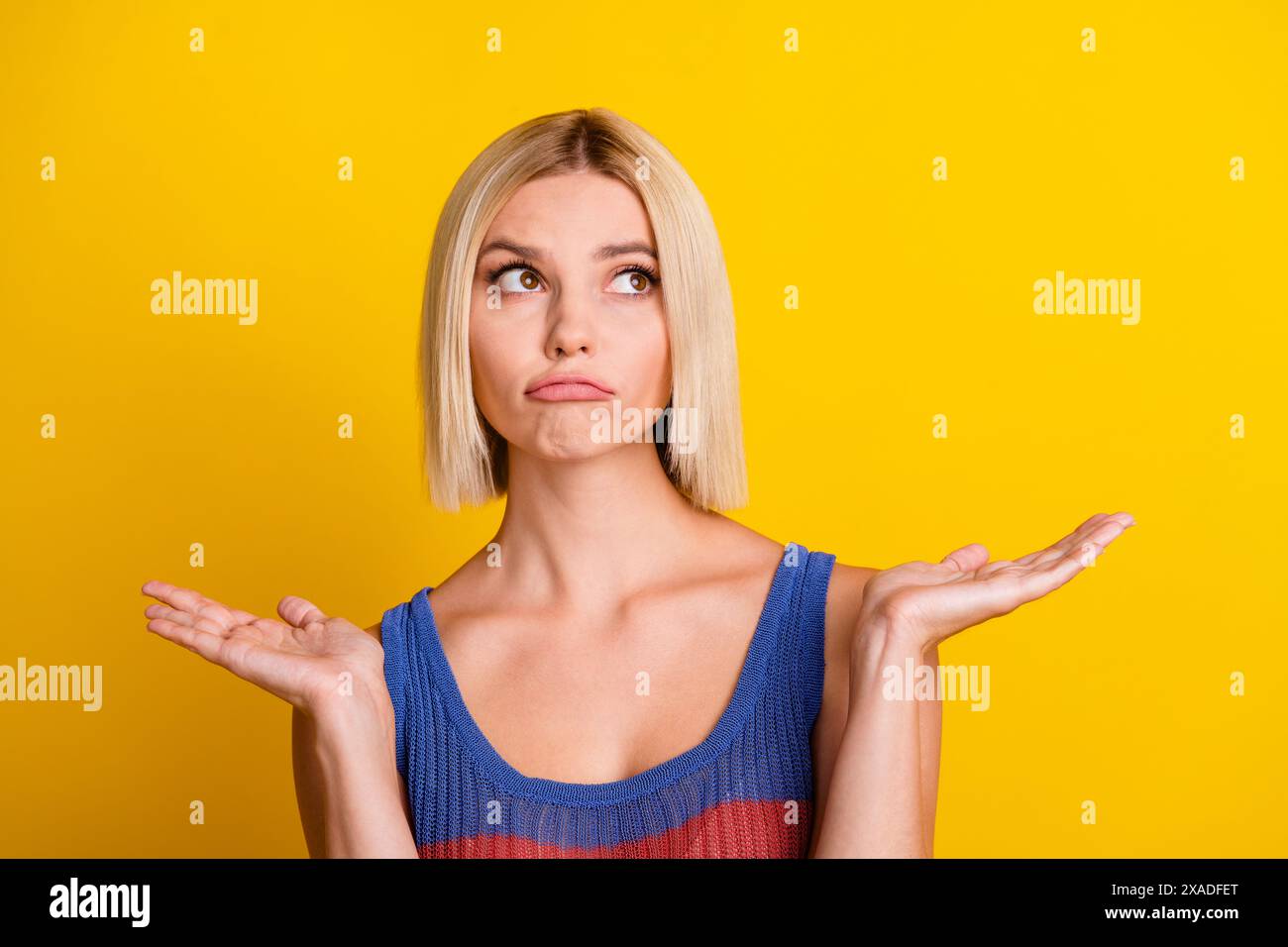 Photo portrait of young confused funny cute beautiful woman shrugging ...