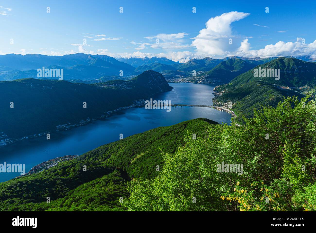 The mountains and the landscape of lake Lugano, during a spring day ...