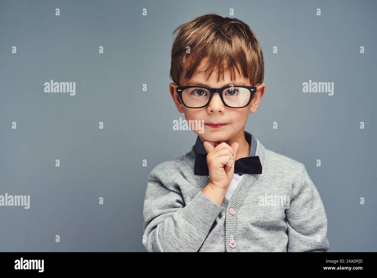 Fashion, glasses and portrait of boy genius with space on studio on ...