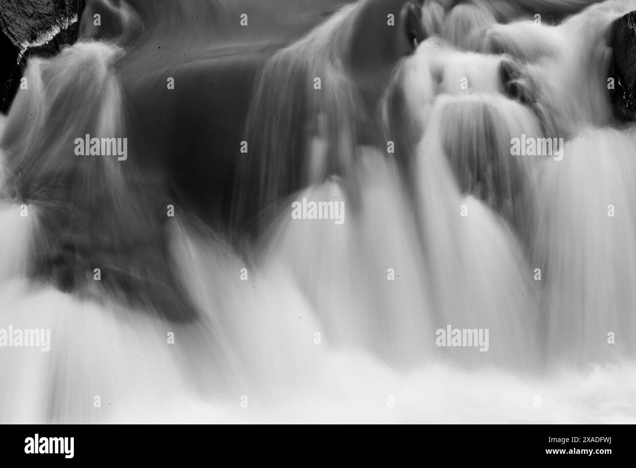 Abstract motion blur of water falling over rock formations at Great ...