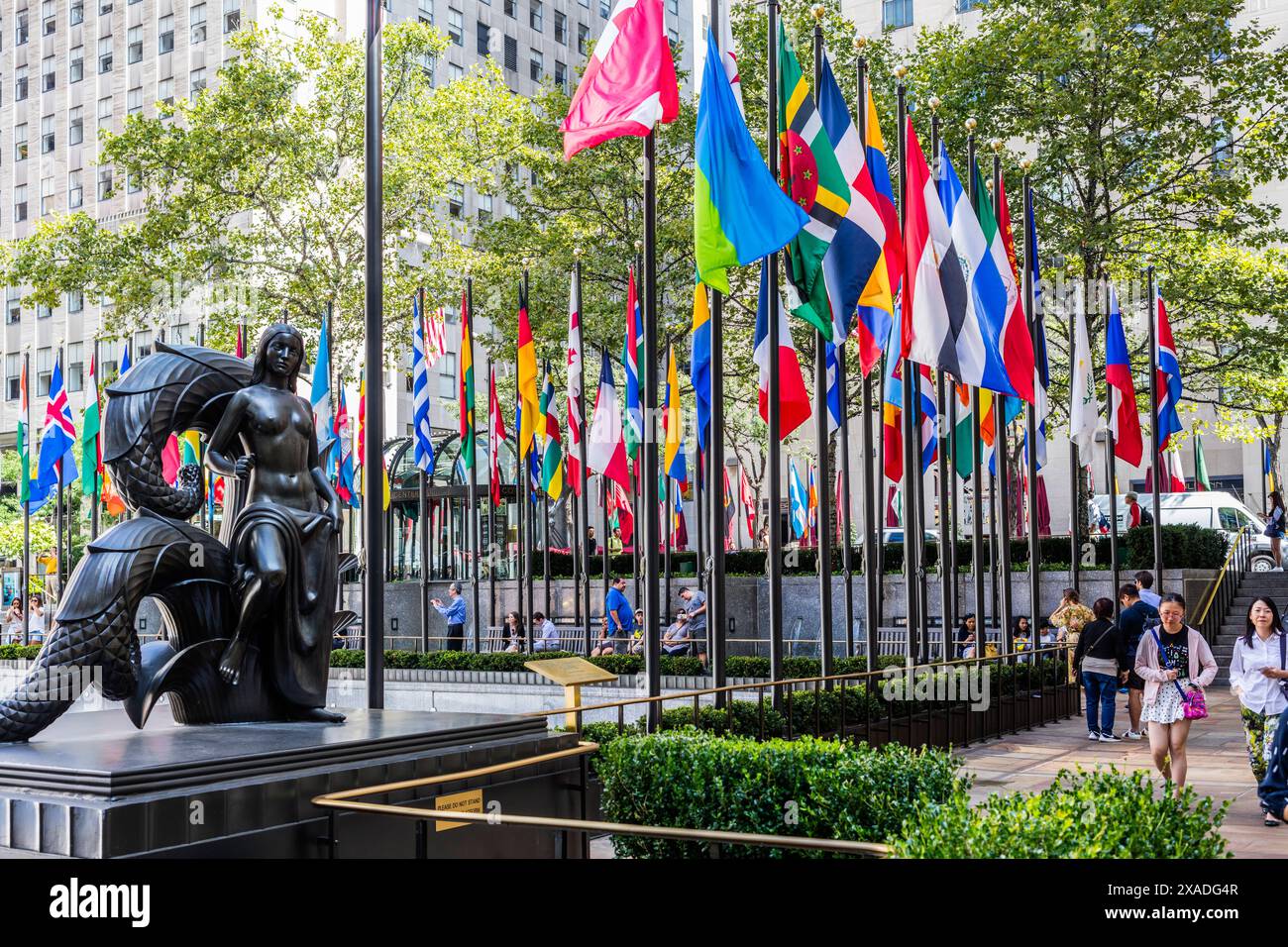 New York City, United States - August 25, 2017: Tourists, flags and ...