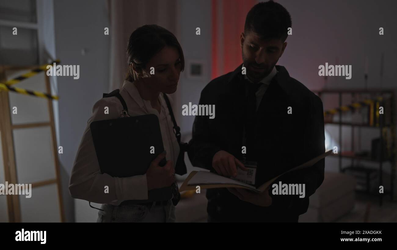 Detective partners analyzing crime hi-res stock photography and images ...