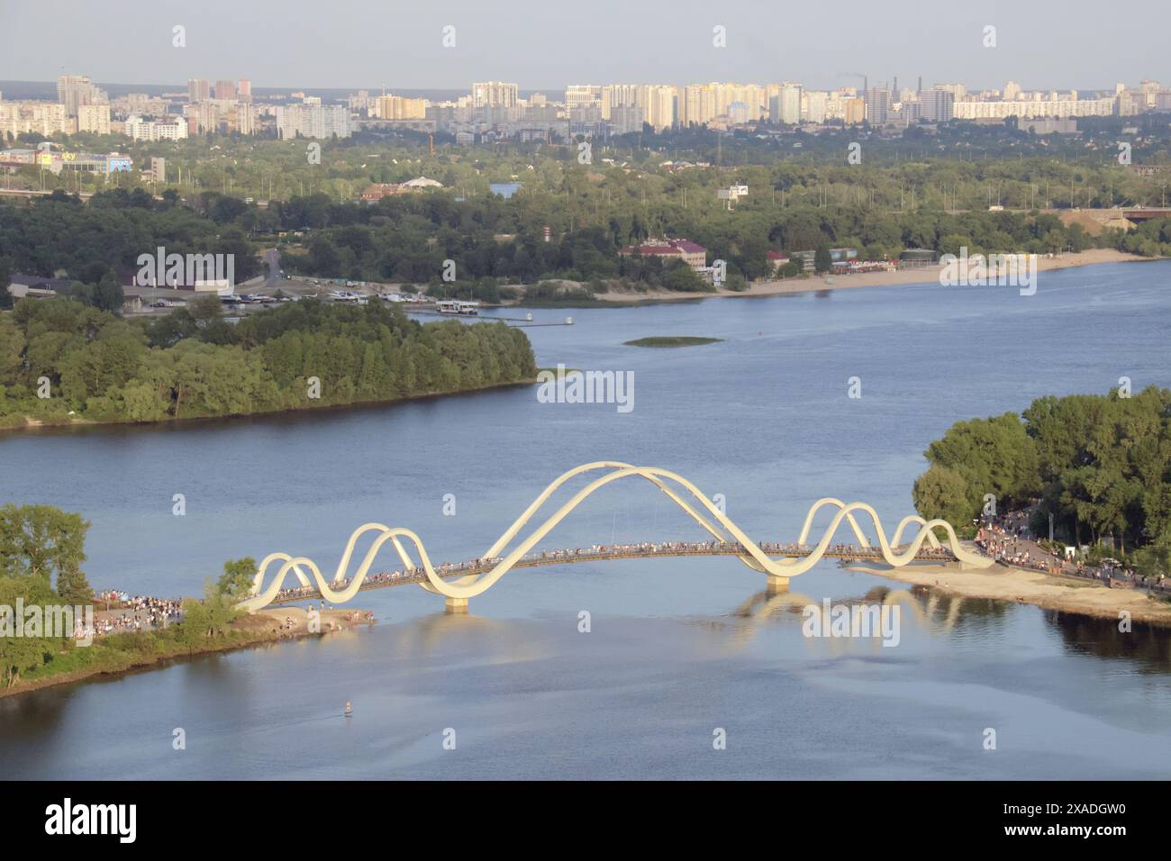 KYIV, UKRAINE - JUNE 1, 2024 - The wave-shaped pedestrian bridge ...