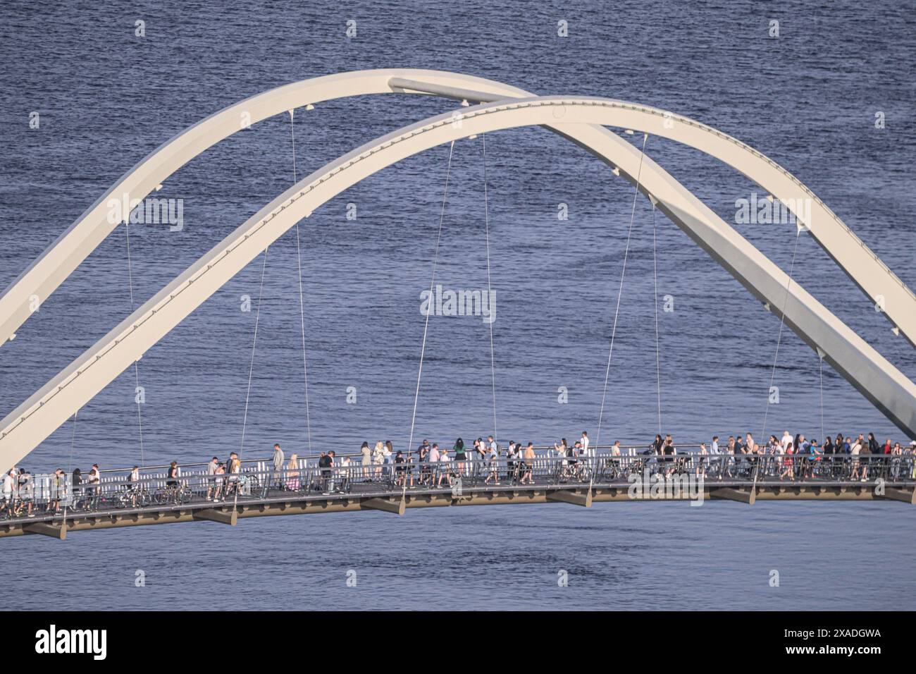 KYIV, UKRAINE - JUNE 1, 2024 - The wave-shaped pedestrian bridge ...