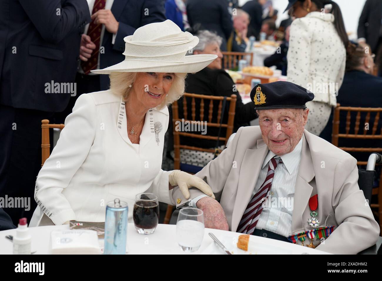 Queen Camilla speaks with Royal Navy D-Day veteran Richard Trelease, 99 ...