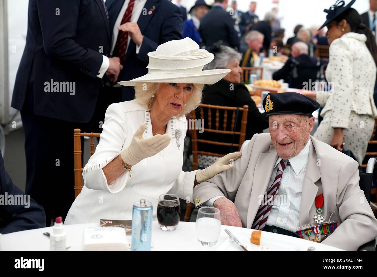 Queen Camilla speaks with Royal Navy D-Day veteran Richard Trelease, 99 ...