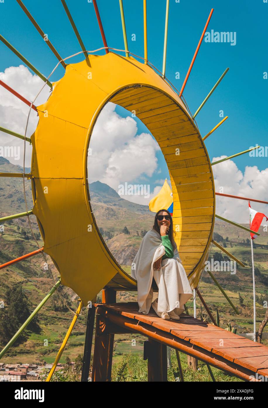 Girl in viewpoint yellow circle, traveling through the peruvian andes ...