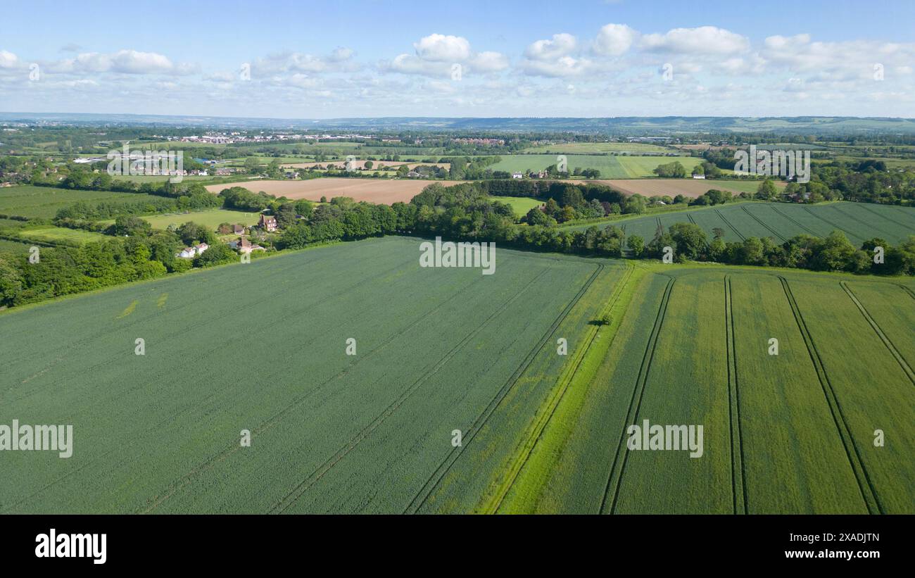 Aerial view of farmland and the Weald of Kent looking north from above ...