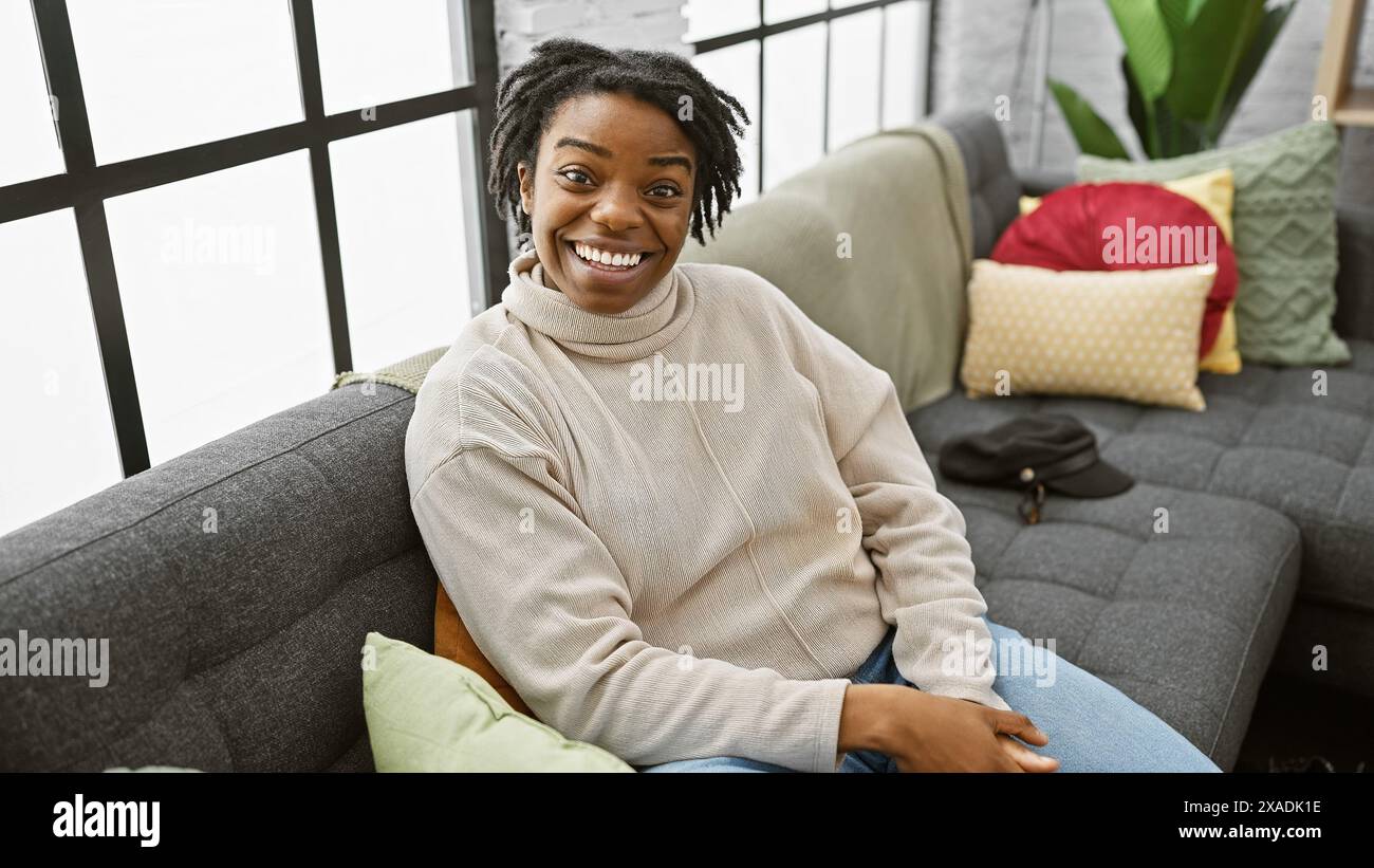 Content african american woman dreadlocks hi-res stock photography and ...