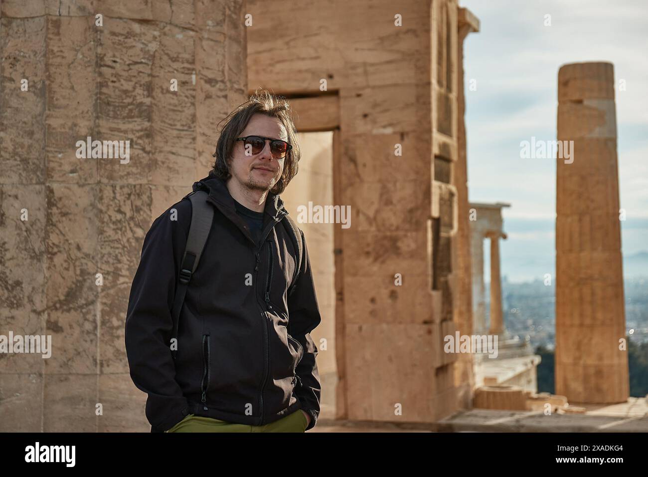 Acropolis of Athens, entrance gate pillars with tourist Stock Photo - Alamy