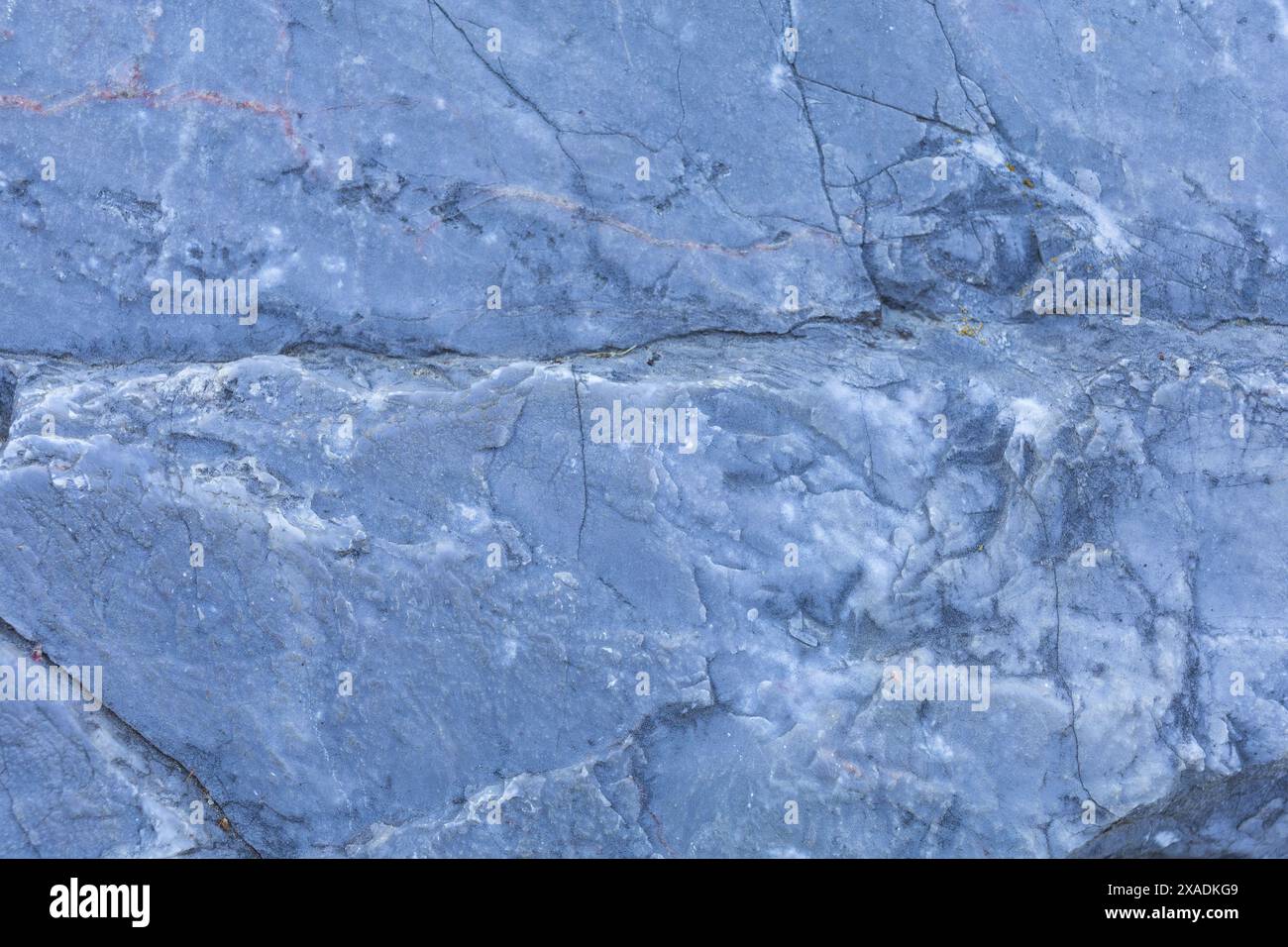 flat photography of a blue grey granite stone with cracked textured ...