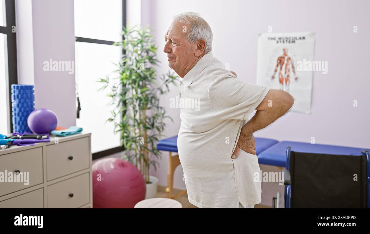 Elderly man suffering from excruciating back pain undergoes ...