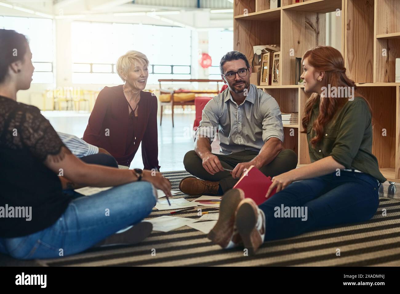 Group, circle or business people sitting on floor for collaboration ...