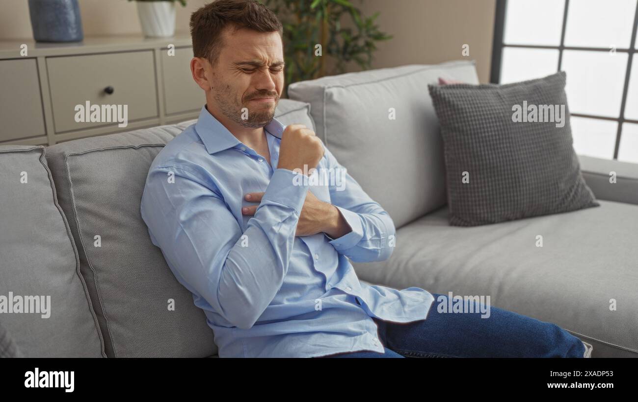 Hispanic man clutching chest pain hi-res stock photography and images ...