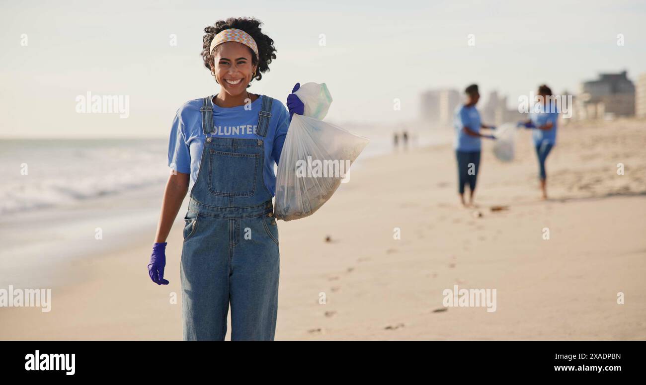 Beach, volunteer or happy woman with plastic bag for sustainability ...