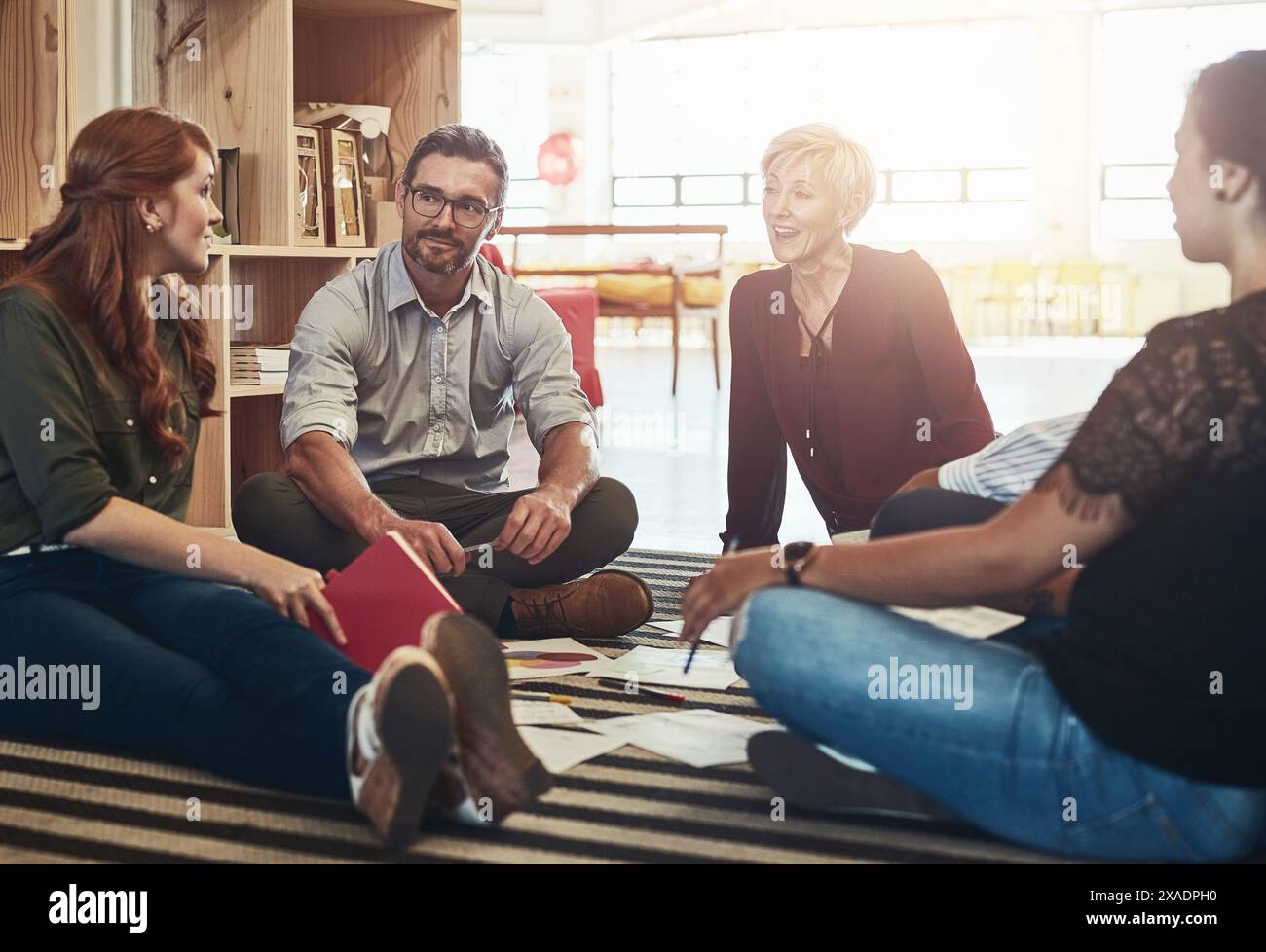 Group, circle or business people sitting on floor for collaboration ...