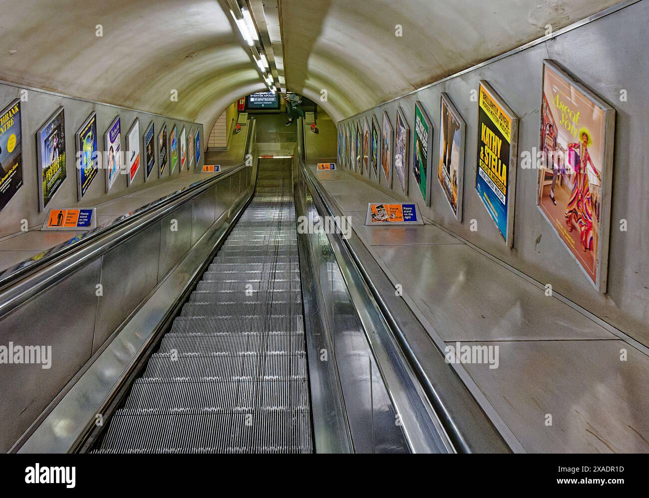 London Underground tube looking down typical escalators used between ...