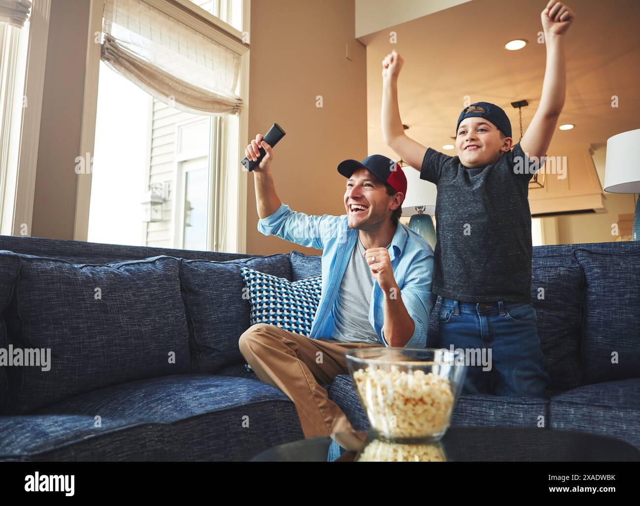Popcorn relax dad watching hi-res stock photography and images - Alamy