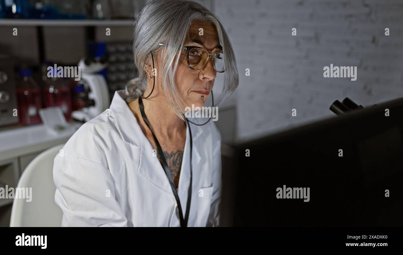 In the heart of night, a middle-aged, grey-haired woman scientist ...