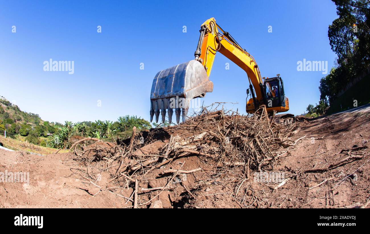 Construction industrial excavator machine closeup steel bin scooping ...