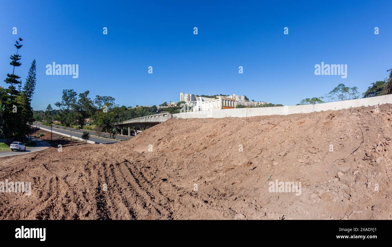 Construction industrial earthworks landscaping on highway bridge ramp ...