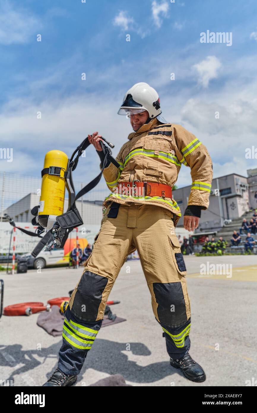 A firefighter dons the essential components of their professional gear ...