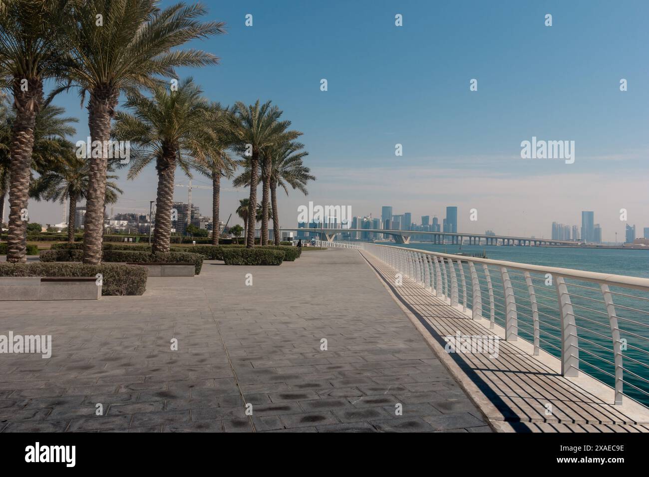 Abu Dhabi cityscape with palm trees and promenade. Landscape view of ...