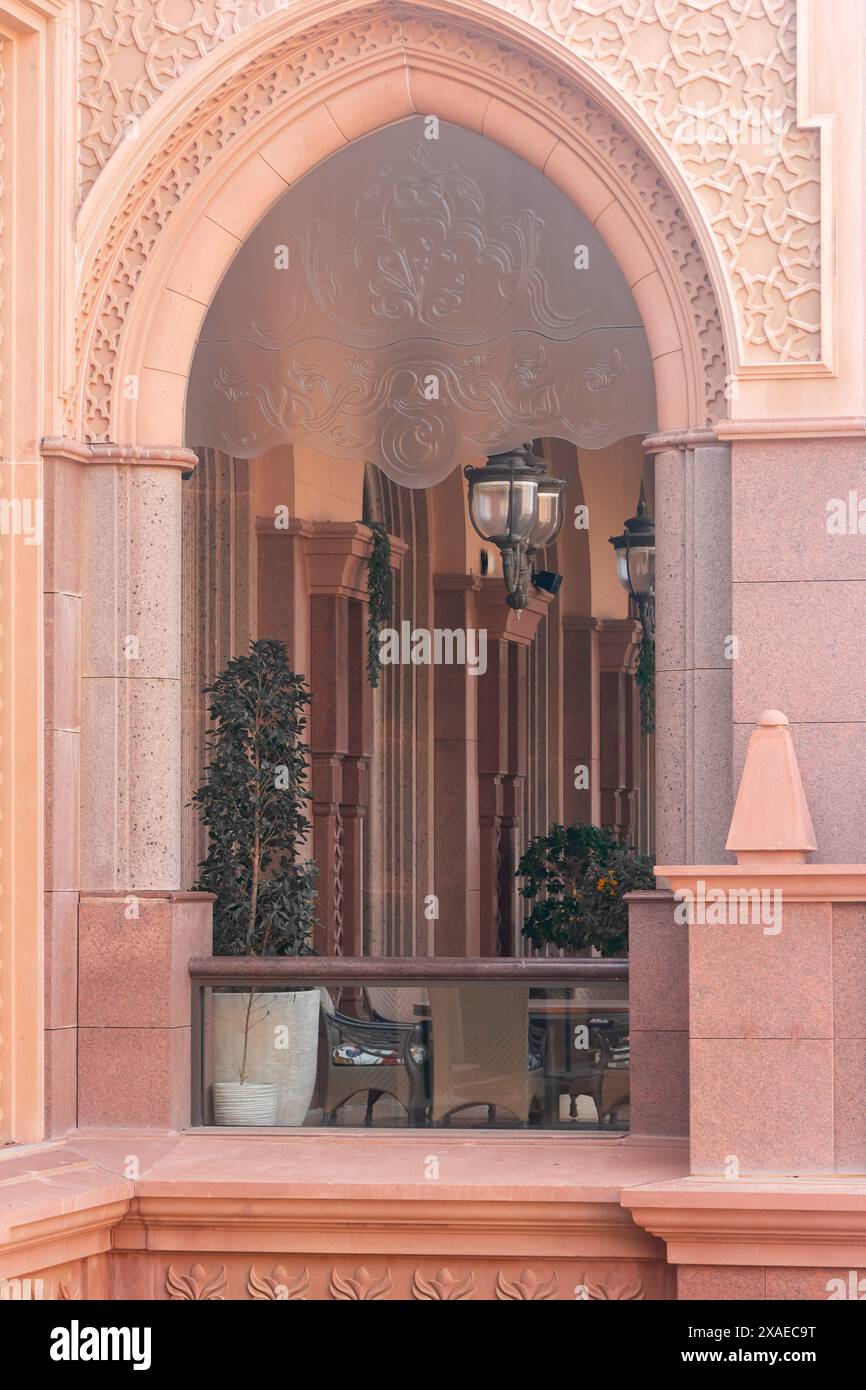Arabic-style balcony with arches. A balcony view of Emirates Palace in ...