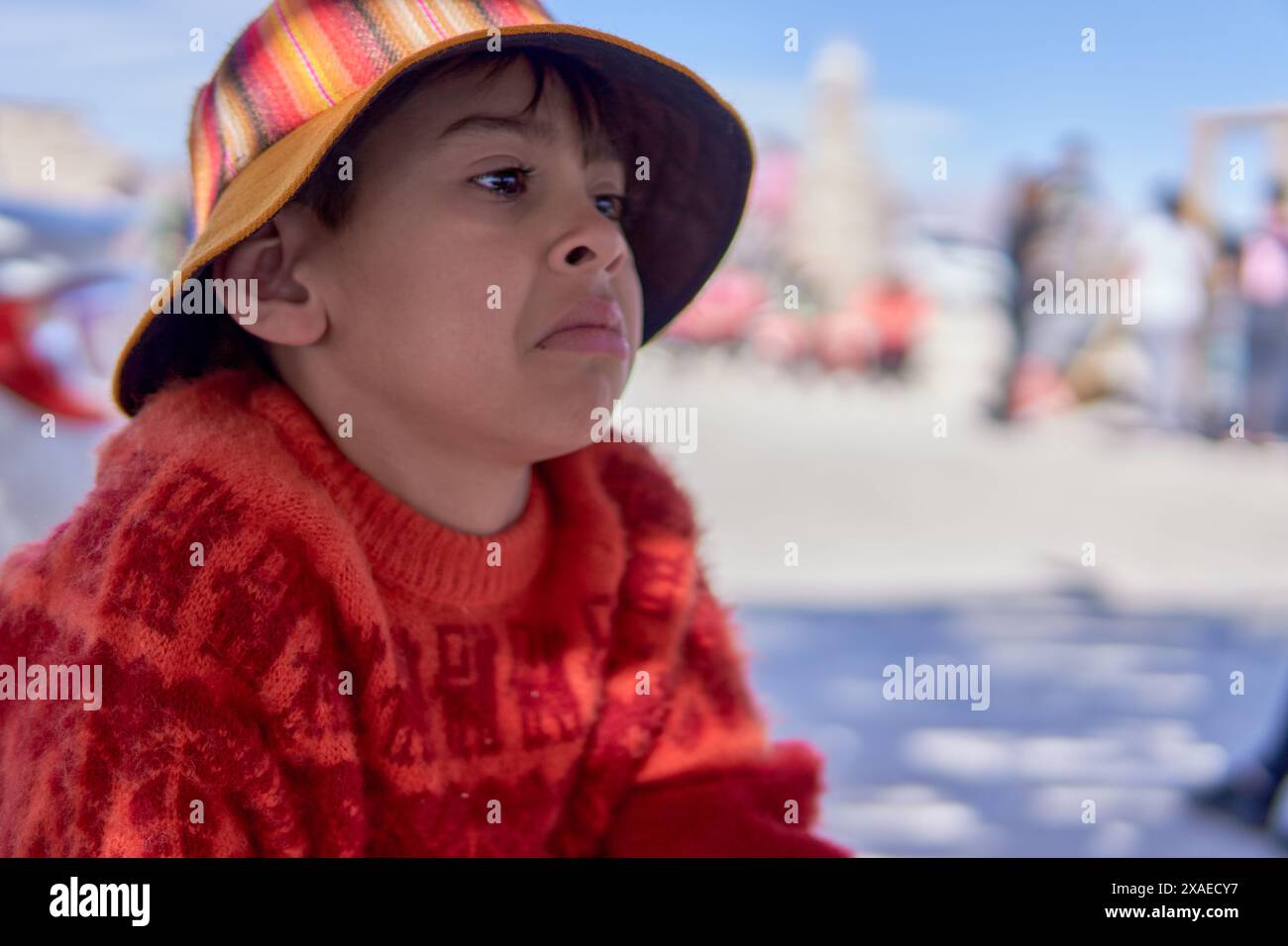 portrait of latin boy with rustic cap and sweater in profile crying ... portrait of latin boy with rustic cap and sweater in profile crying ...