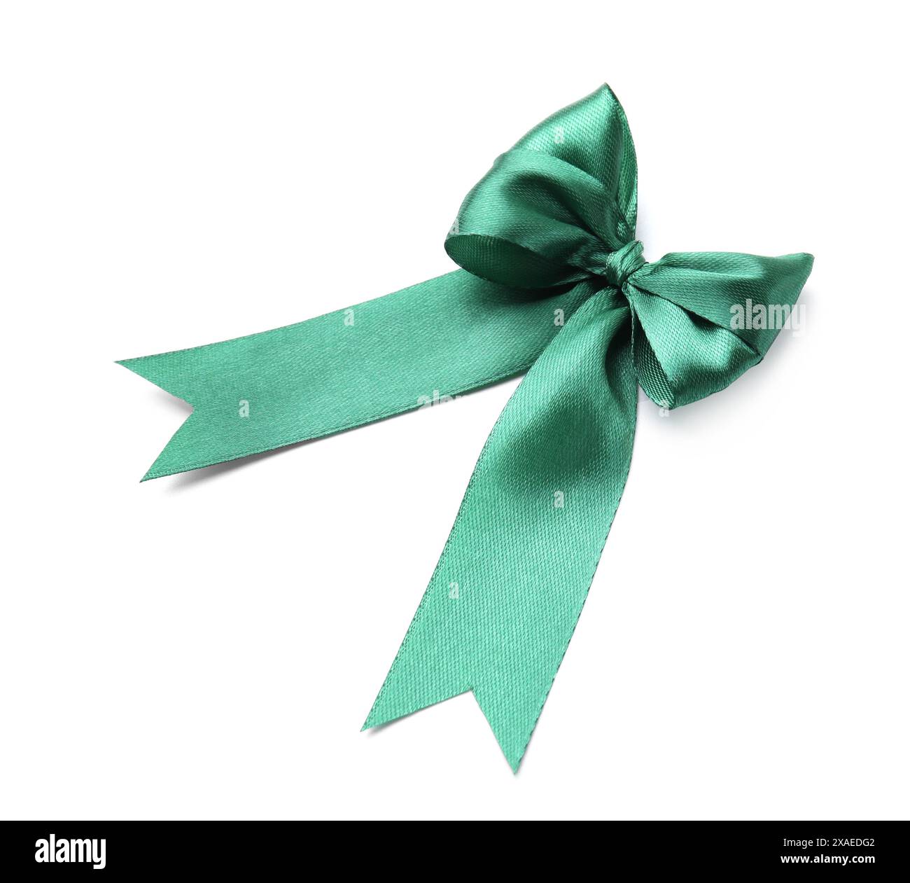 Green satin ribbon bow isolated on white, top view Stock Photo - Alamy