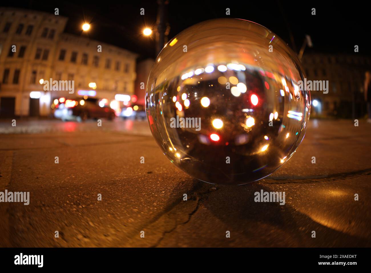 Crystal ball on asphalt road at night. Wide-angle lens Stock Photo - Alamy
