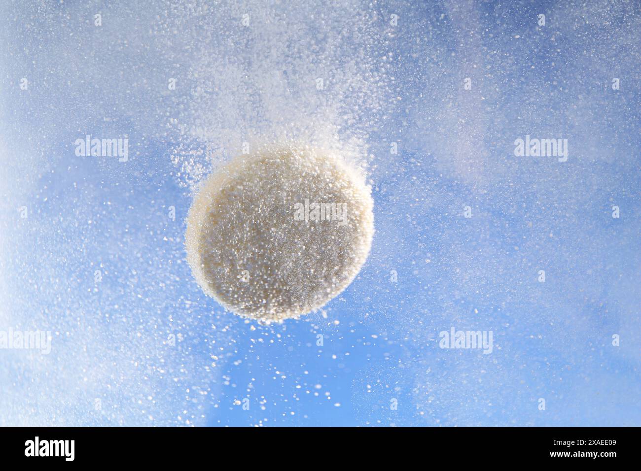 Closeup effervescent tablet falling in hi-res stock photography and ...