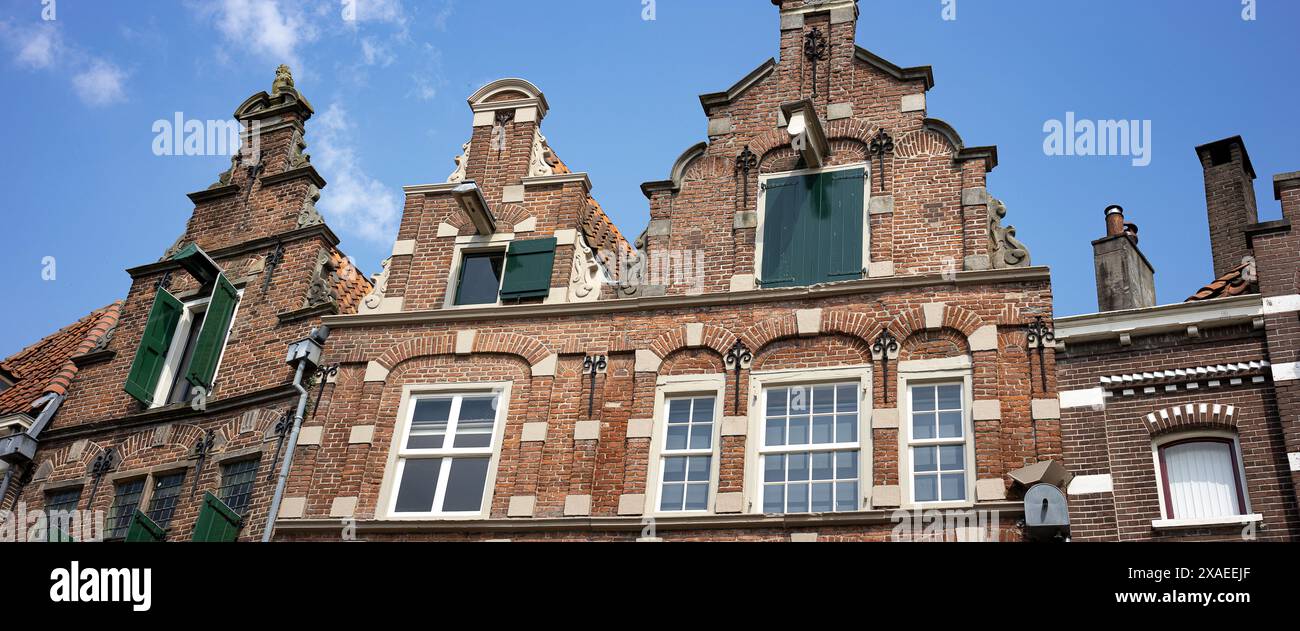 Row of typical historic medieval exterior facades of Hanseatic city ...