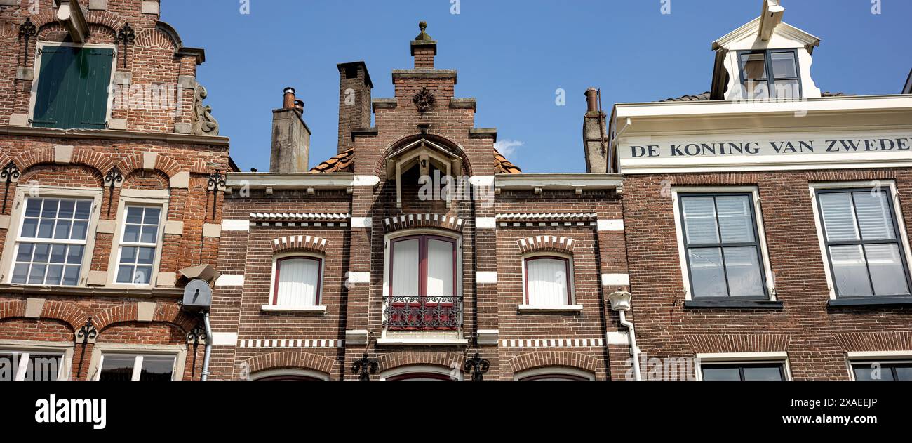 Row of typical historic medieval exterior facades of Hanseatic city ...
