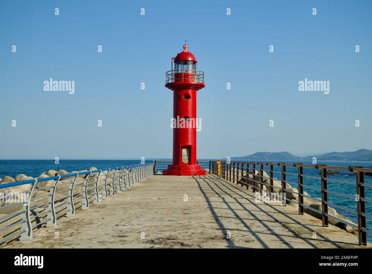 Gangneung City, South Korea - May 18, 2024: The striking red lighthouse ...