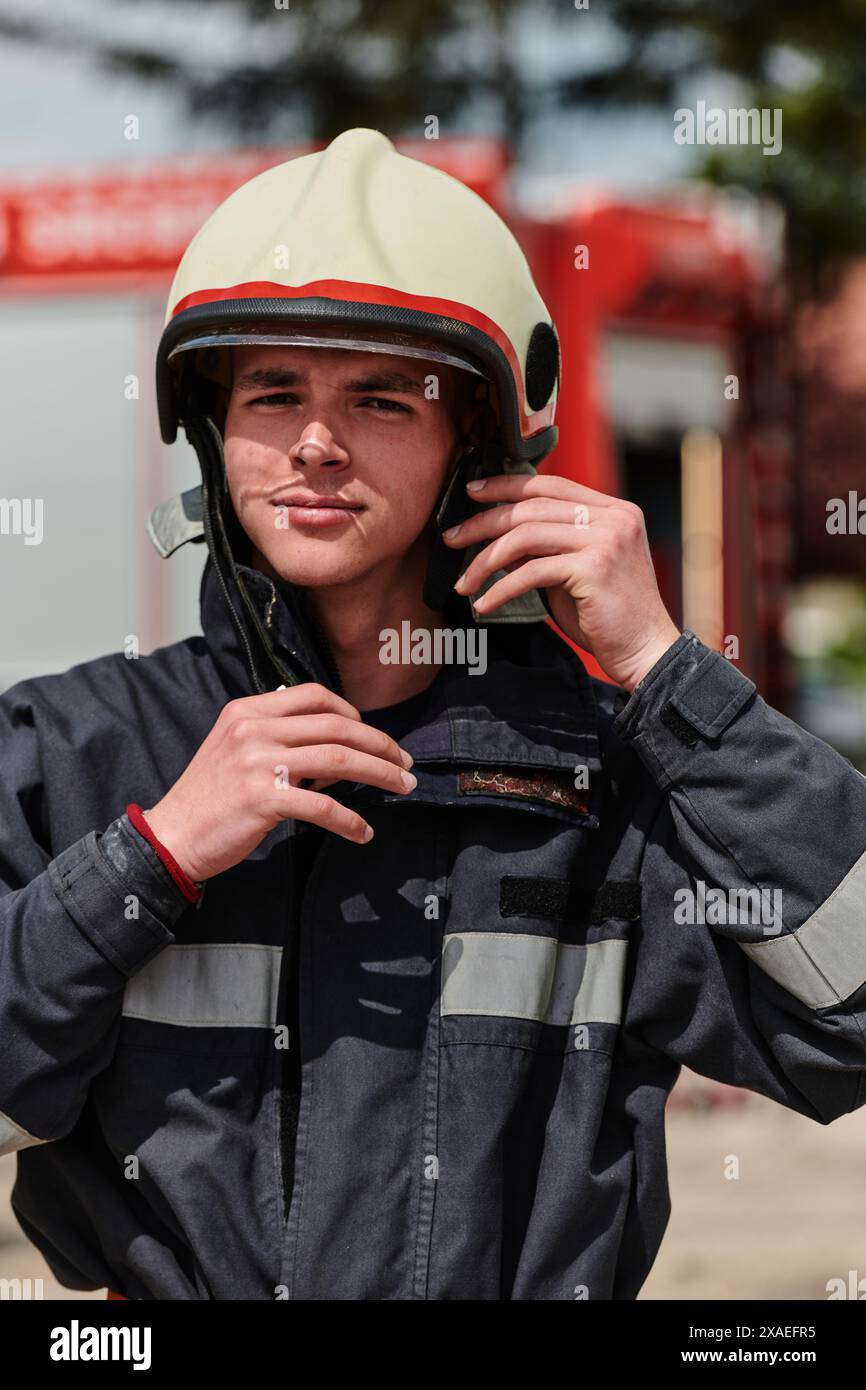 Firefighter Stands Proudly with Professional Gear Beside Fire Truck ...