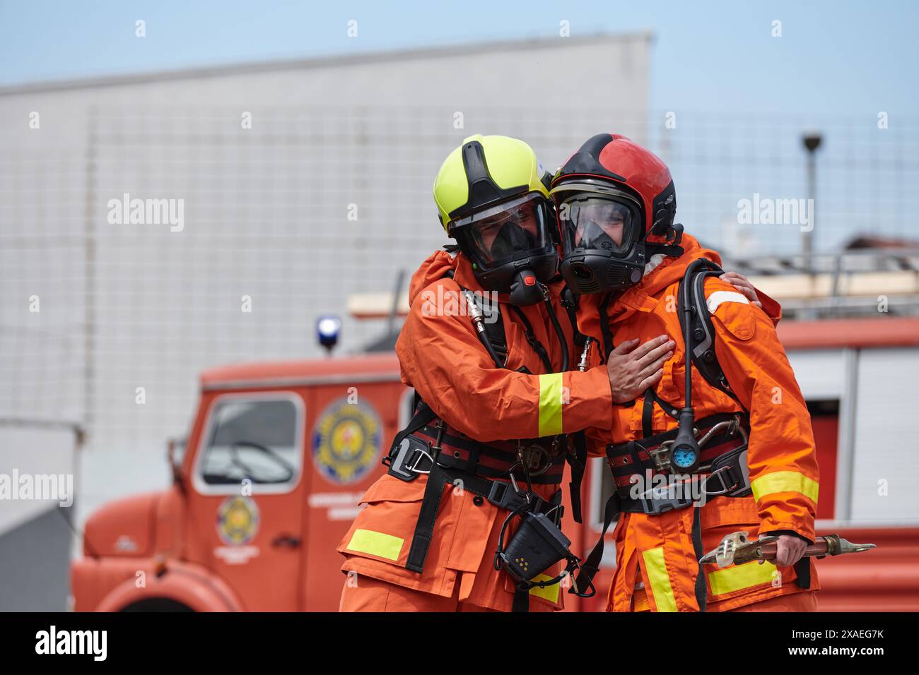 Firefighter Team Training with Various Tools in Professional Gear Stock ...