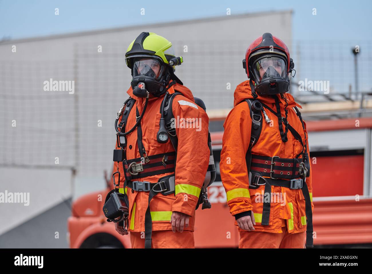 Firefighter Team Training with Various Tools in Professional Gear Stock ...