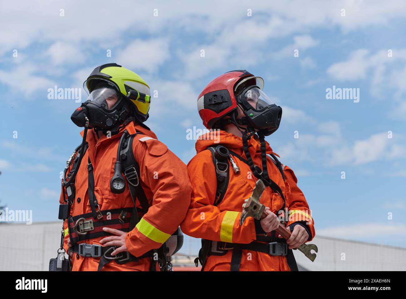 Firefighter Team Training with Various Tools in Professional Gear Stock ...