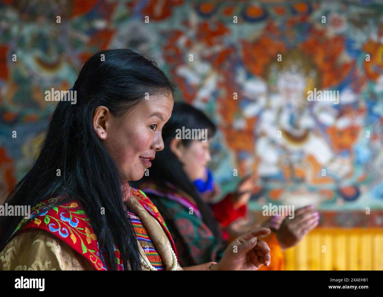 Bhutanese women dancing during Ura Yakchoe in the temple, Bumthang, Ura ...