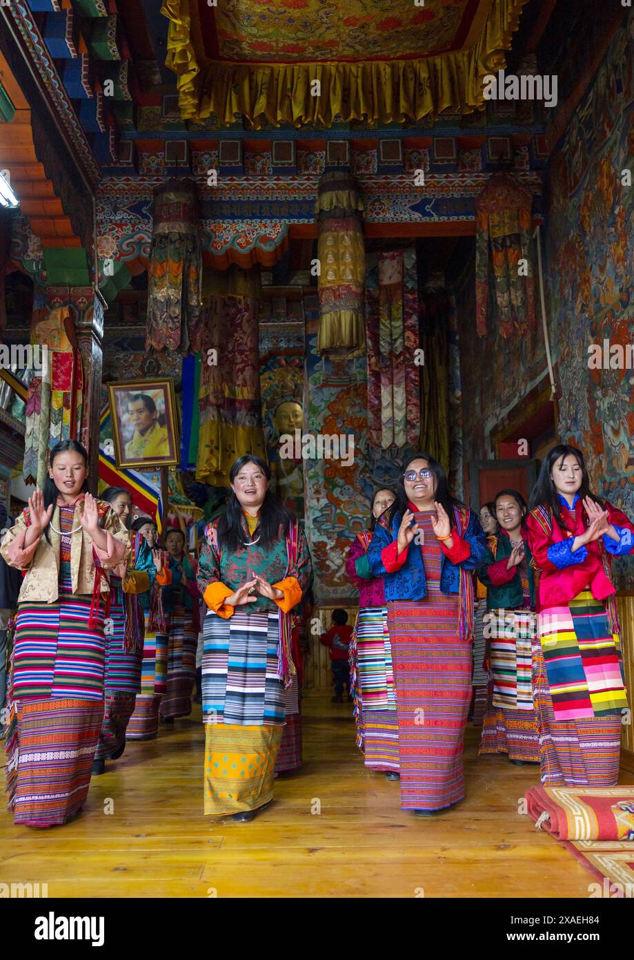 Bhutanese women dancing during Ura Yakchoe in the temple, Bumthang, Ura ...