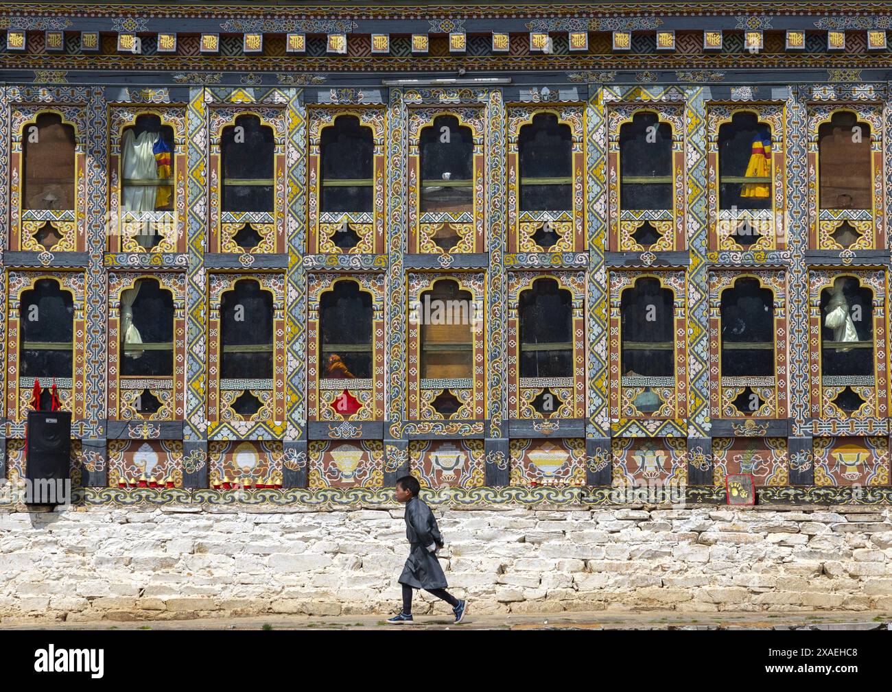Bhutanese boy in Ura Lhakhang monastery, Bumthang, Ura, Bhutan Stock ...