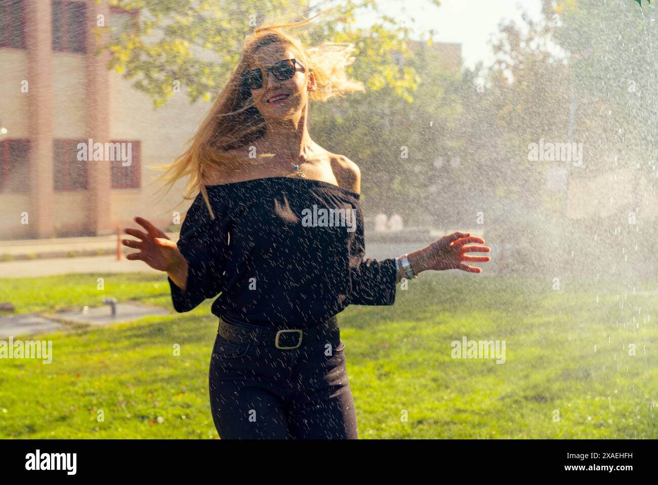 Woman getting wet rain hi-res stock photography and images - Alamy