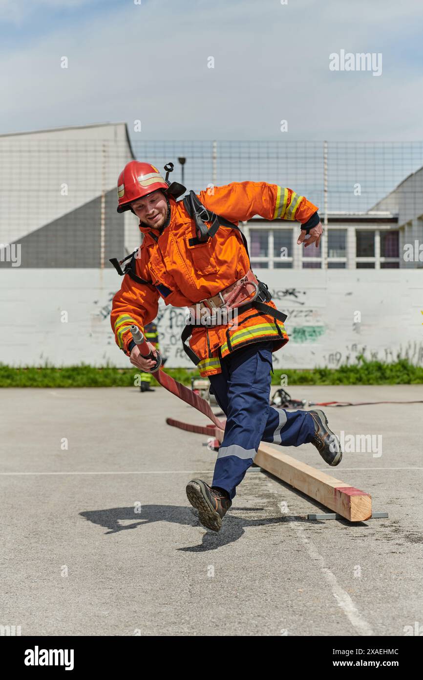 Firefighter Training and Preparing in Professional Gear for Job Hazards Stock Photo - Alamy