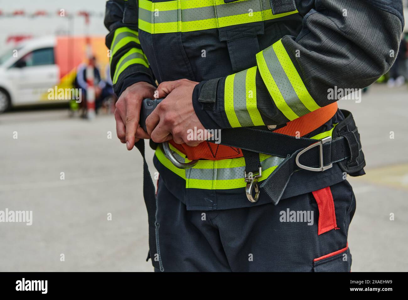Professional Firefighter Suits Up in Full Gear for Duty Stock Photo - Alamy