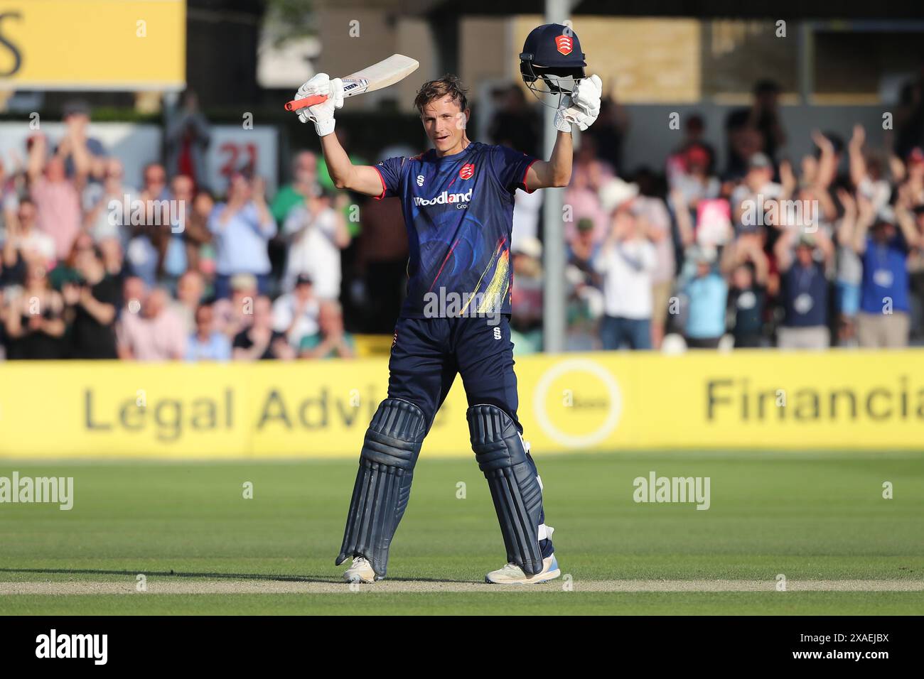 Michael Pepper of Essex raises his bat after reaching his century ...