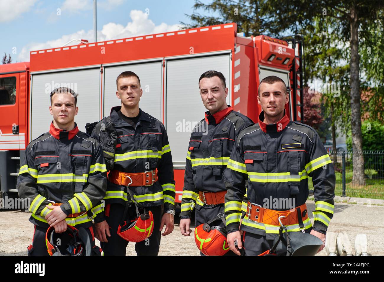 Team of Professional Firefighters Ready in Full Gear for Dangerous ...
